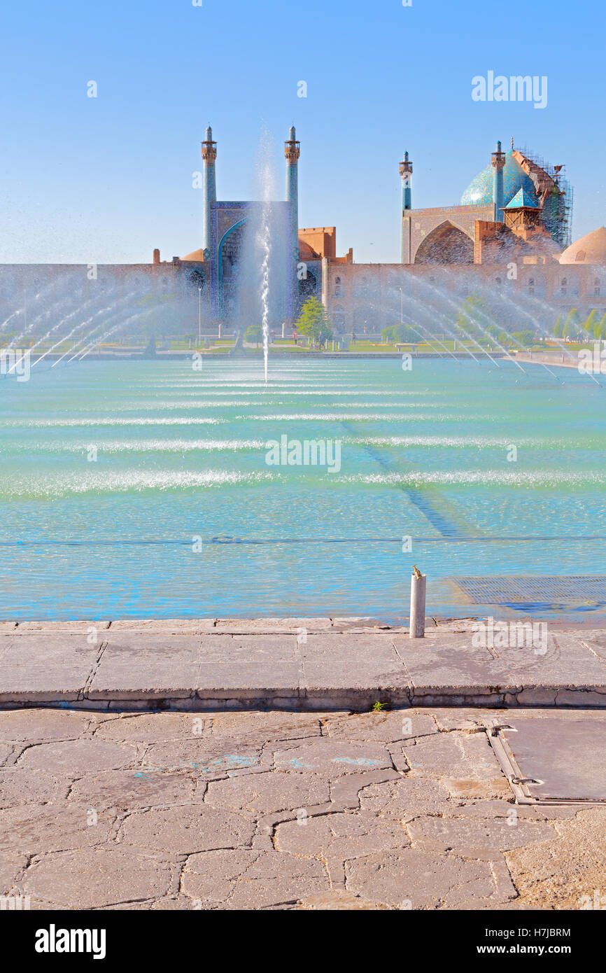 in iran old square mosque and fountain water backlight Stock Photo - Alamy