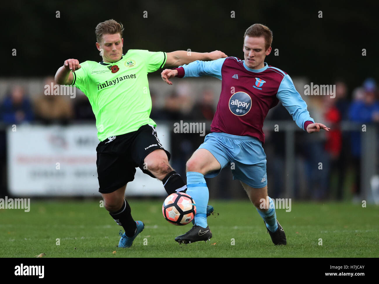 Westfields' Matt Reeve and Curzon Ashton's Iain Howard (left) battle ...