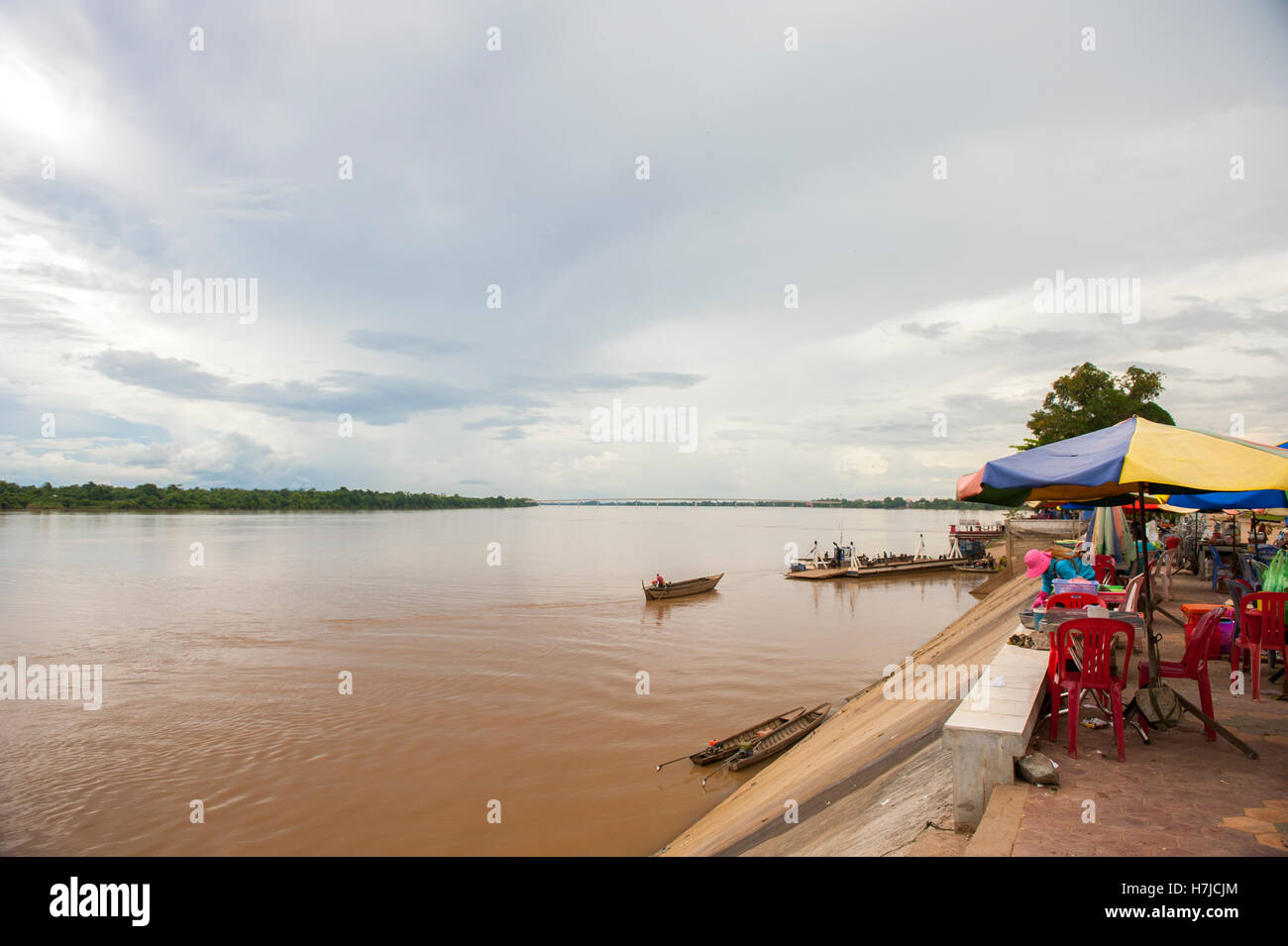 Locals relaxing by the side of the Mekong River in Stung Treng, the ...
