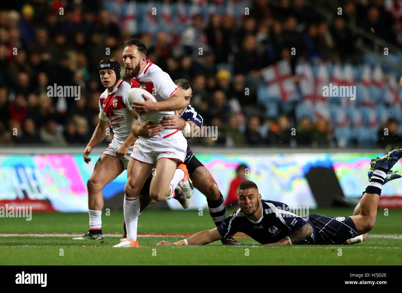 England's Luke Gale gets away from Scotland's Tyler Cassel (right ...