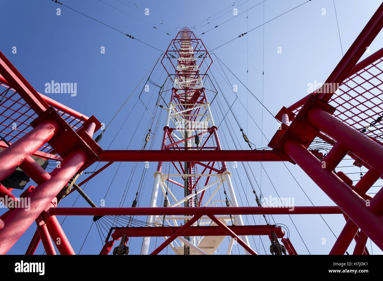 Men painting the highest Czech construction radio transmitter tower ...