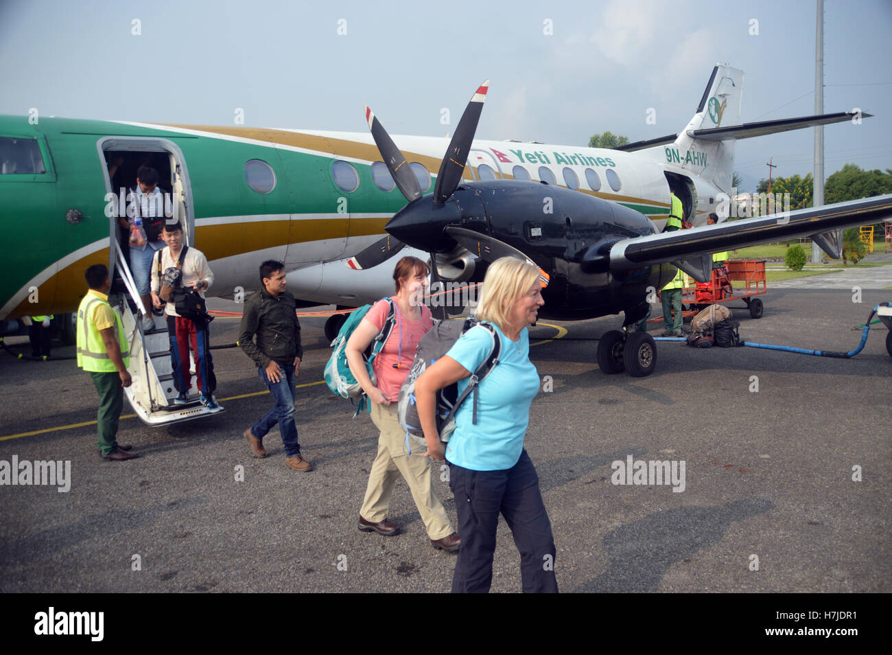 Passengers Arriving on a Jetstream 41Turboprop-powered Plane from a ...