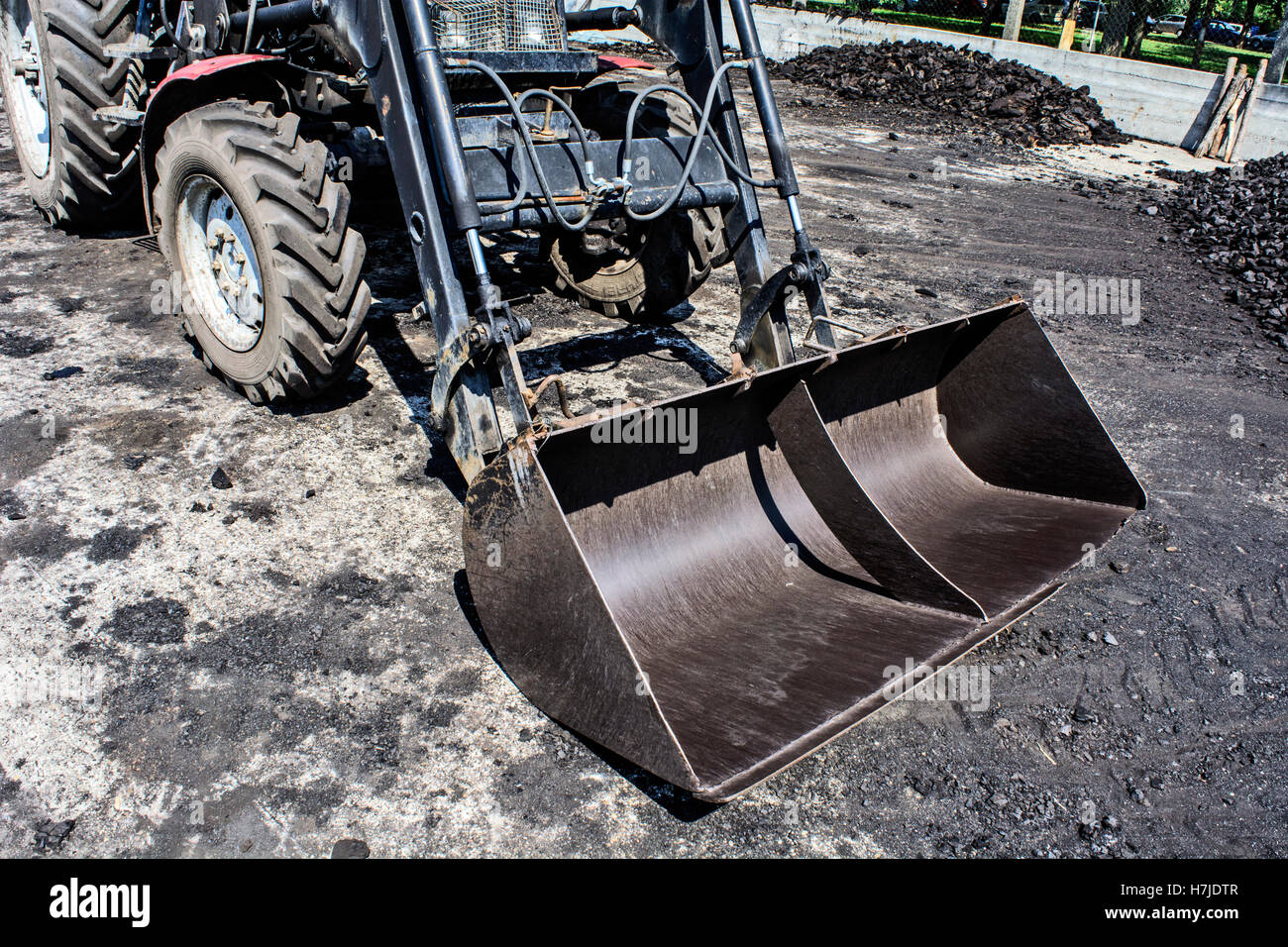 A tractor that is used for loading coal into trucks for further ...