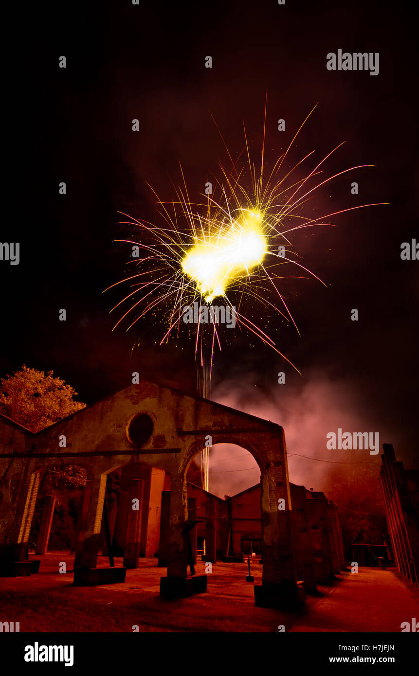 fireworks sparkle colorful in the dark night over the ancient ruins ...