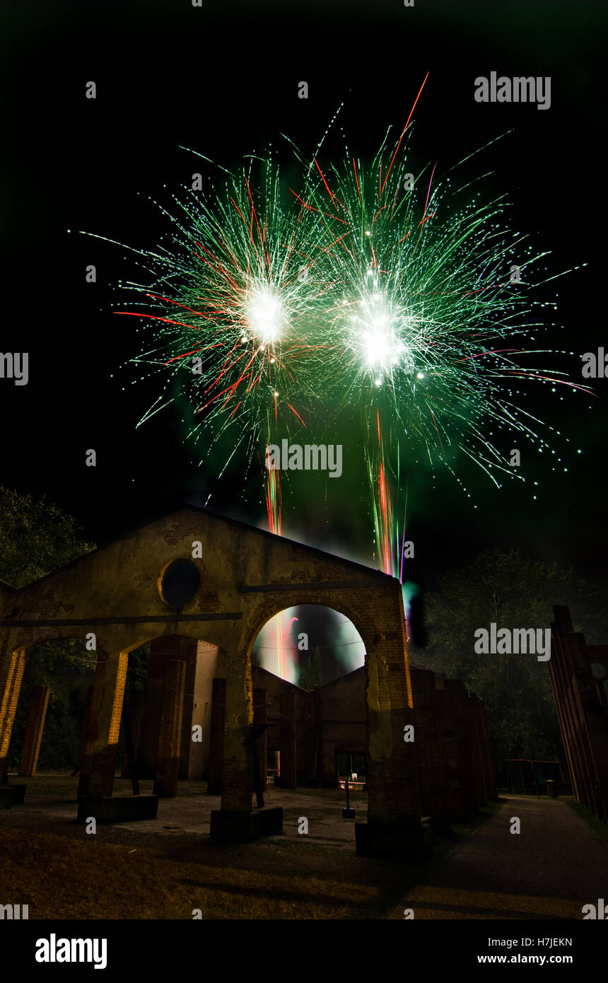 fireworks sparkle colorful in the dark night over the ancient ruins ...