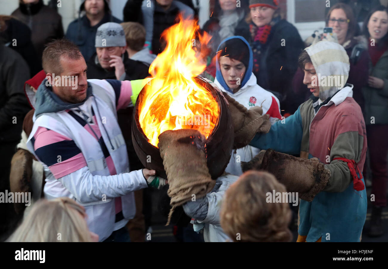 People from the Devonshire village of Ottery St Mary carry the ...