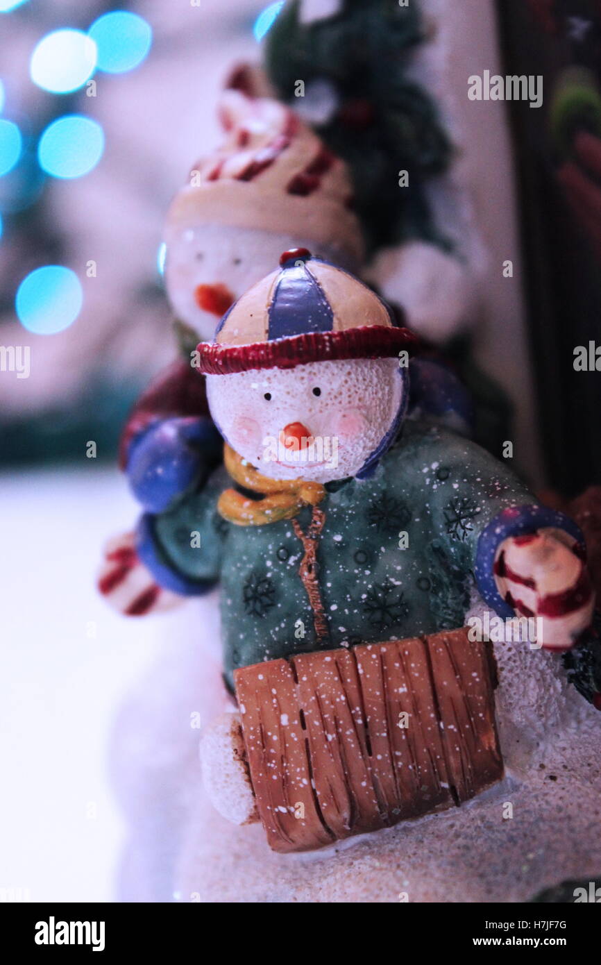 Snowman on sled hi-res stock photography and images - Alamy