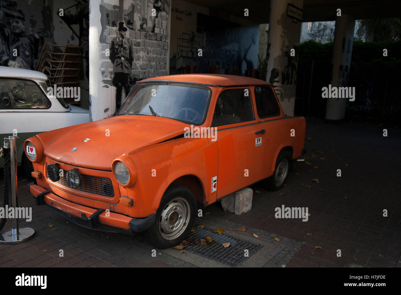 Orange east berlin car in bernauer strasse Stock Photo - Alamy