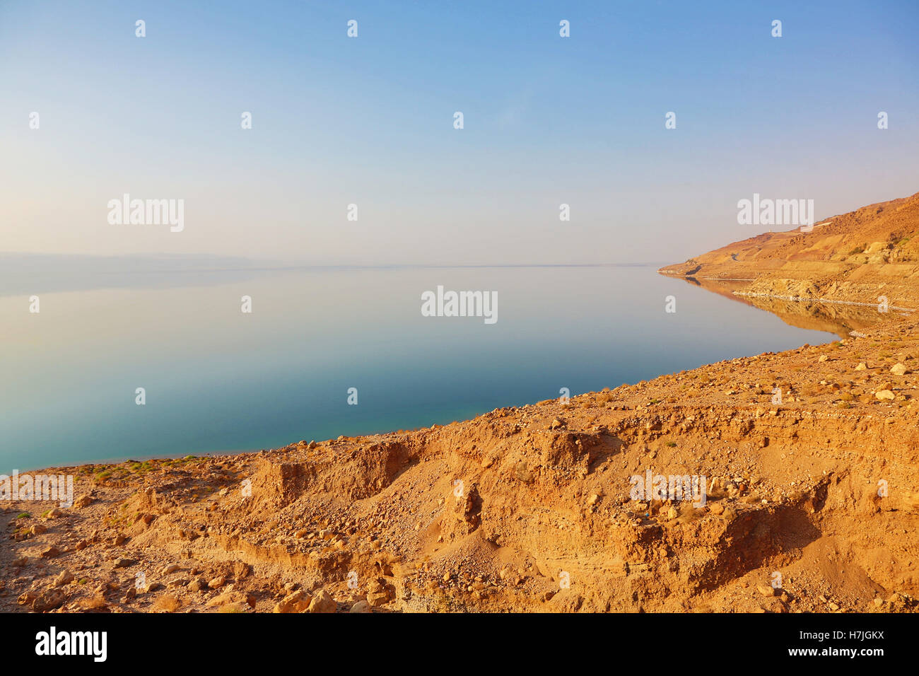 Barren shoreline and salt water of the Dead Sea, Jordan Stock Photo - Alamy