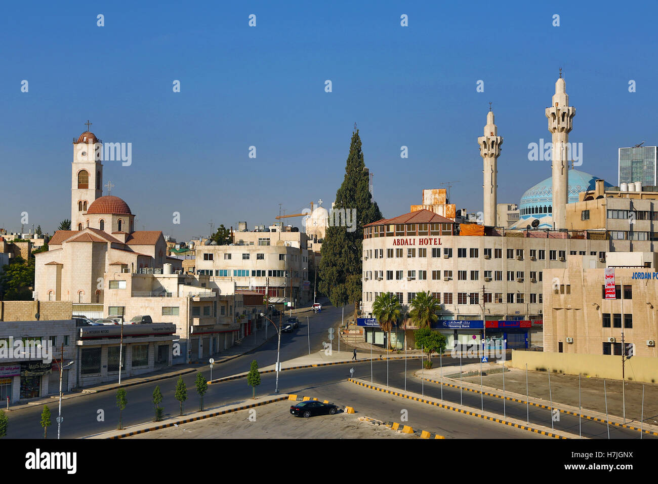 Street scene with King Abdullah I Mosque and Greek Orthodox Church ...
