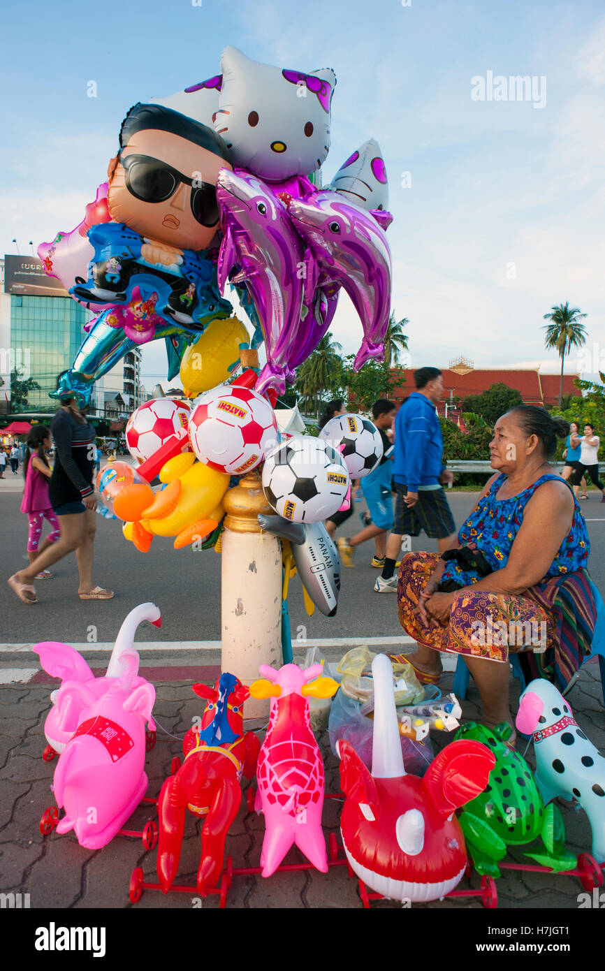 A vendor selling balloons near the riverfront in Vientiane, Laos Stock ...