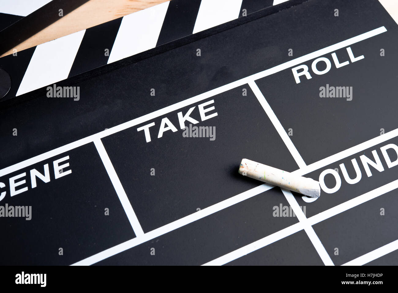 clapper board on wooden Stock Photo - Alamy