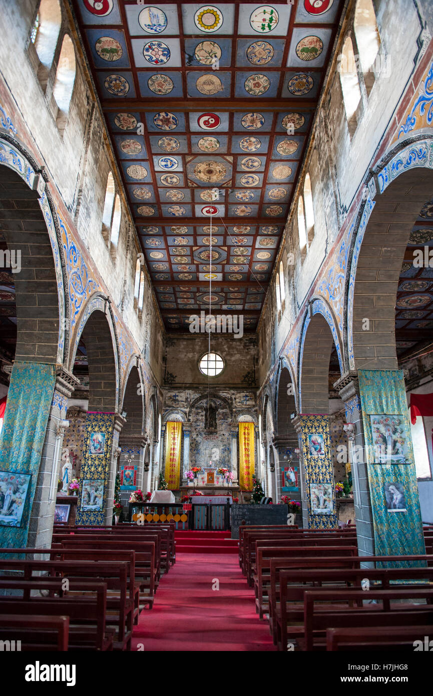 The interior of the Cizhong church, a stone and stucco church built in ...
