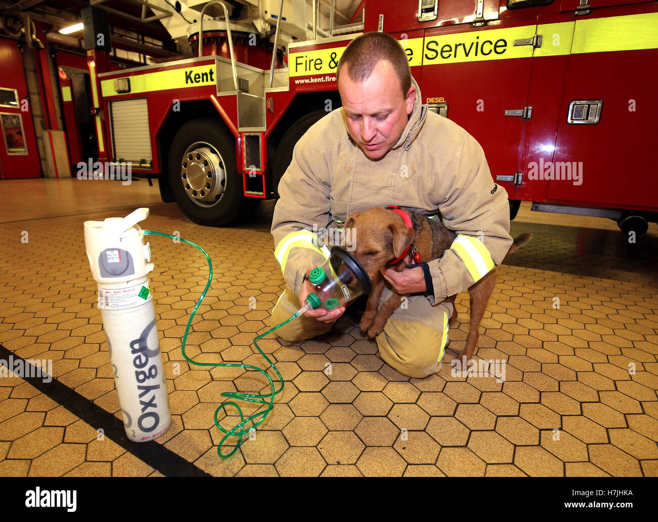 Firefighter Glenn Emery of the Kent Fire and Rescue Service ...