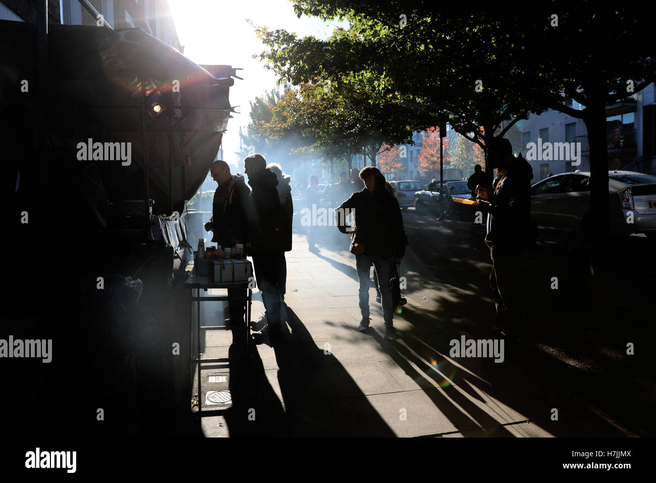 Fans get food from a food stall before the Premier League match at the ...
