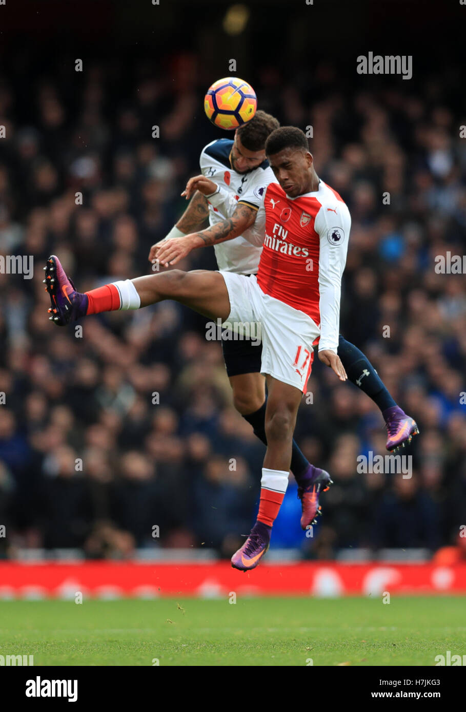 Tottenham Hotspur's Kyle Walker and Arsenal's Alex Iwobi battle for the ...