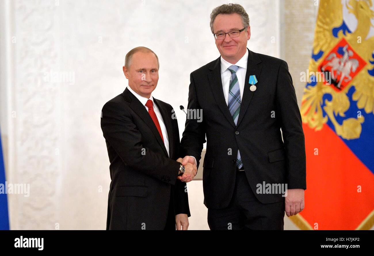 Russian President Vladimir Putin presents the Pushkin Medal to General ...
