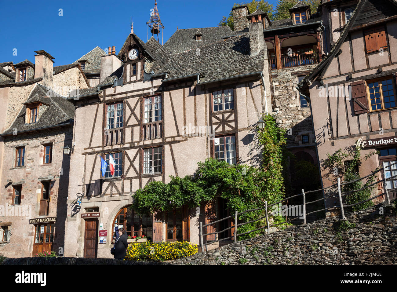 The small medieval village of Conques (France). It shows visitors its ...