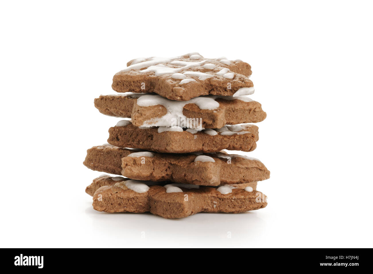 star shaped glazed cocoa christmas cookies isolated Stock Photo - Alamy