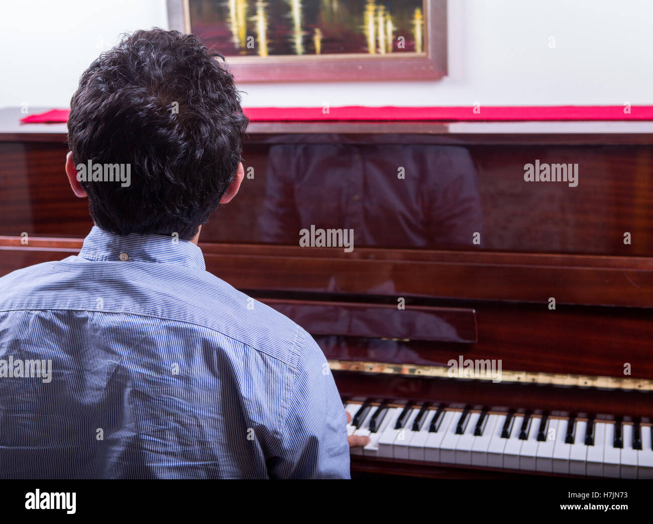 Asian Man Sitting Piano Stock Photos & Asian Man Sitting Piano Stock ...