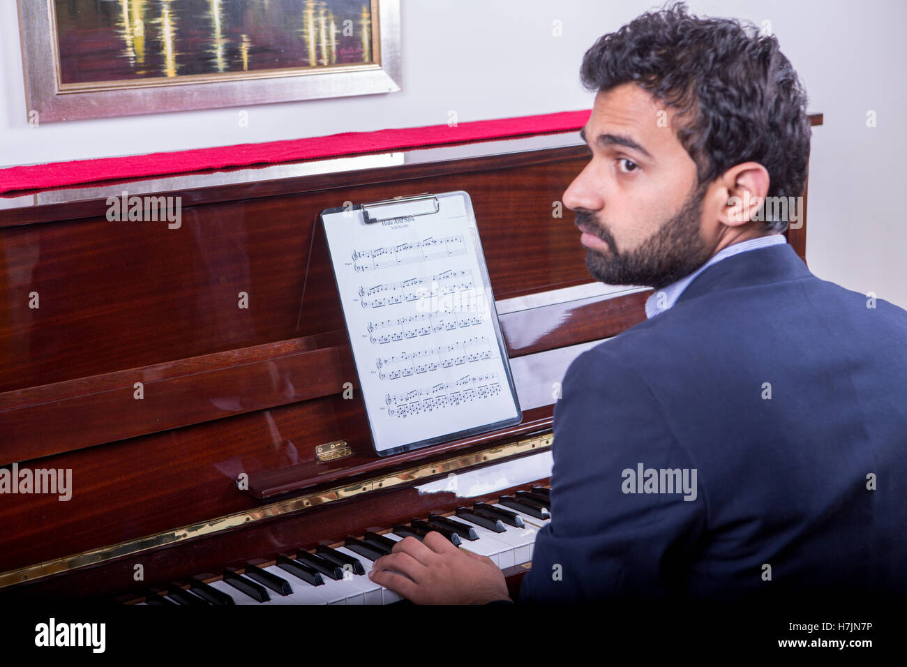 Asian man sitting piano hi-res stock photography and images - Alamy