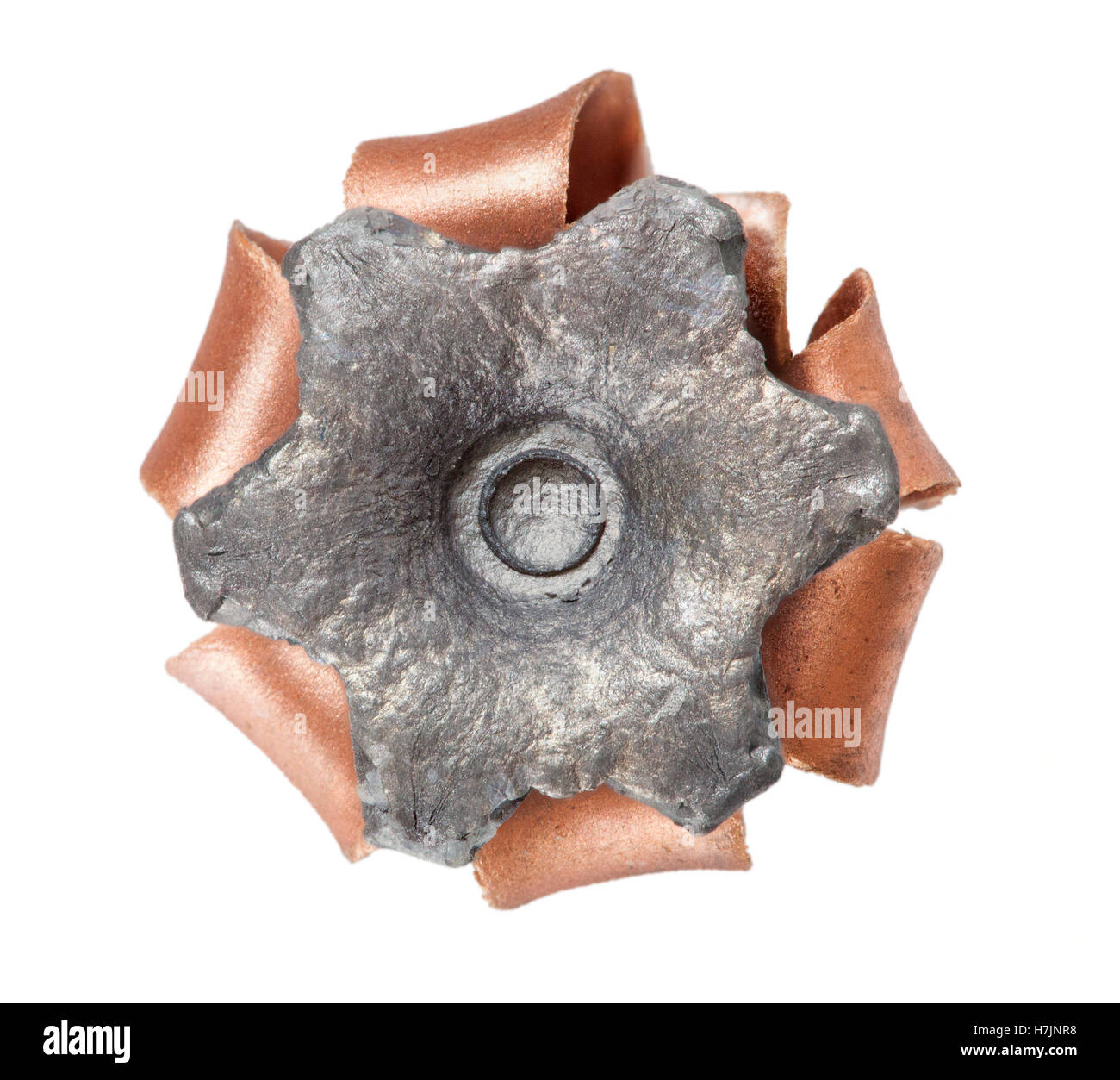 Hollow point bullet with a copper covering that is expanded and ...