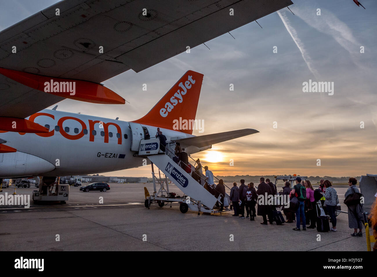 EasyJet plane boarding passengers at Gatwick Airport in the early ...