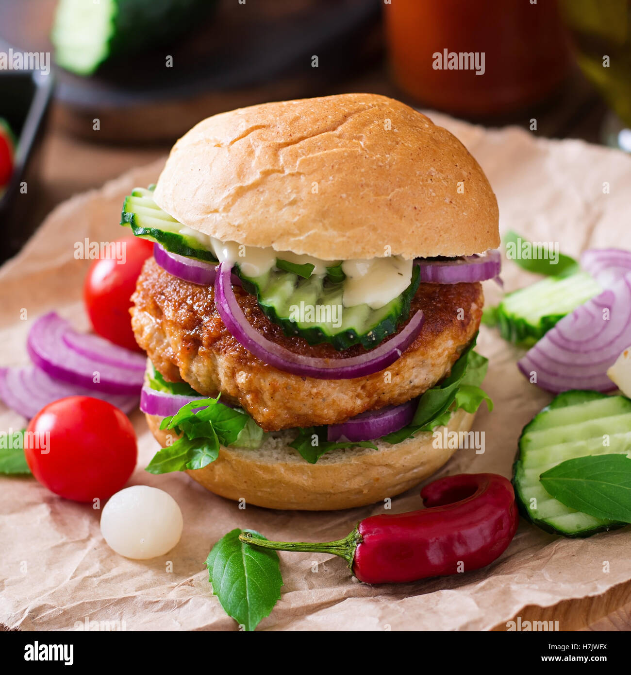 Juicy spicy chicken burgers to Asian-style - sandwich Stock Photo - Alamy