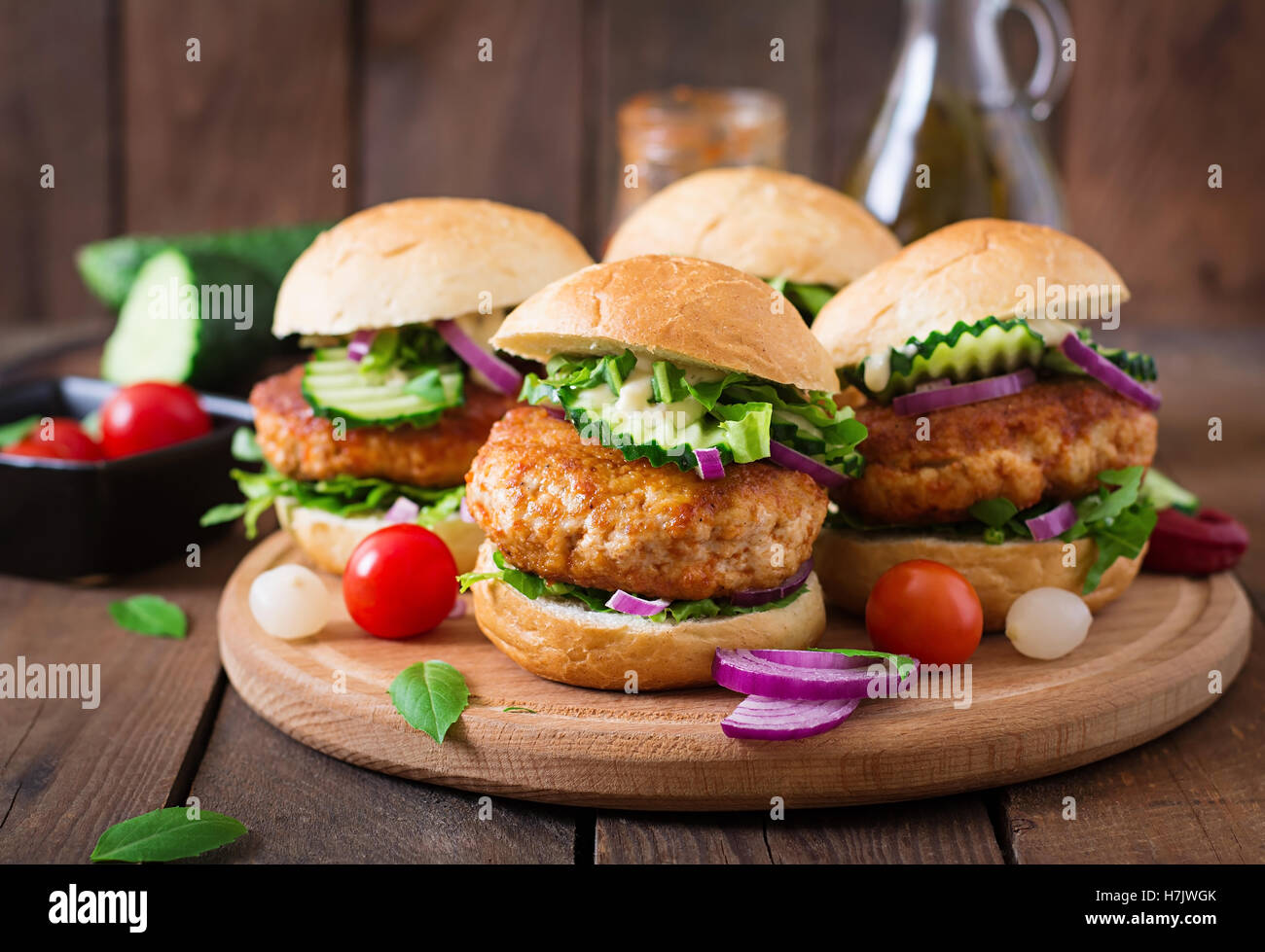 Juicy spicy chicken burgers to Asian-style - sandwich Stock Photo - Alamy