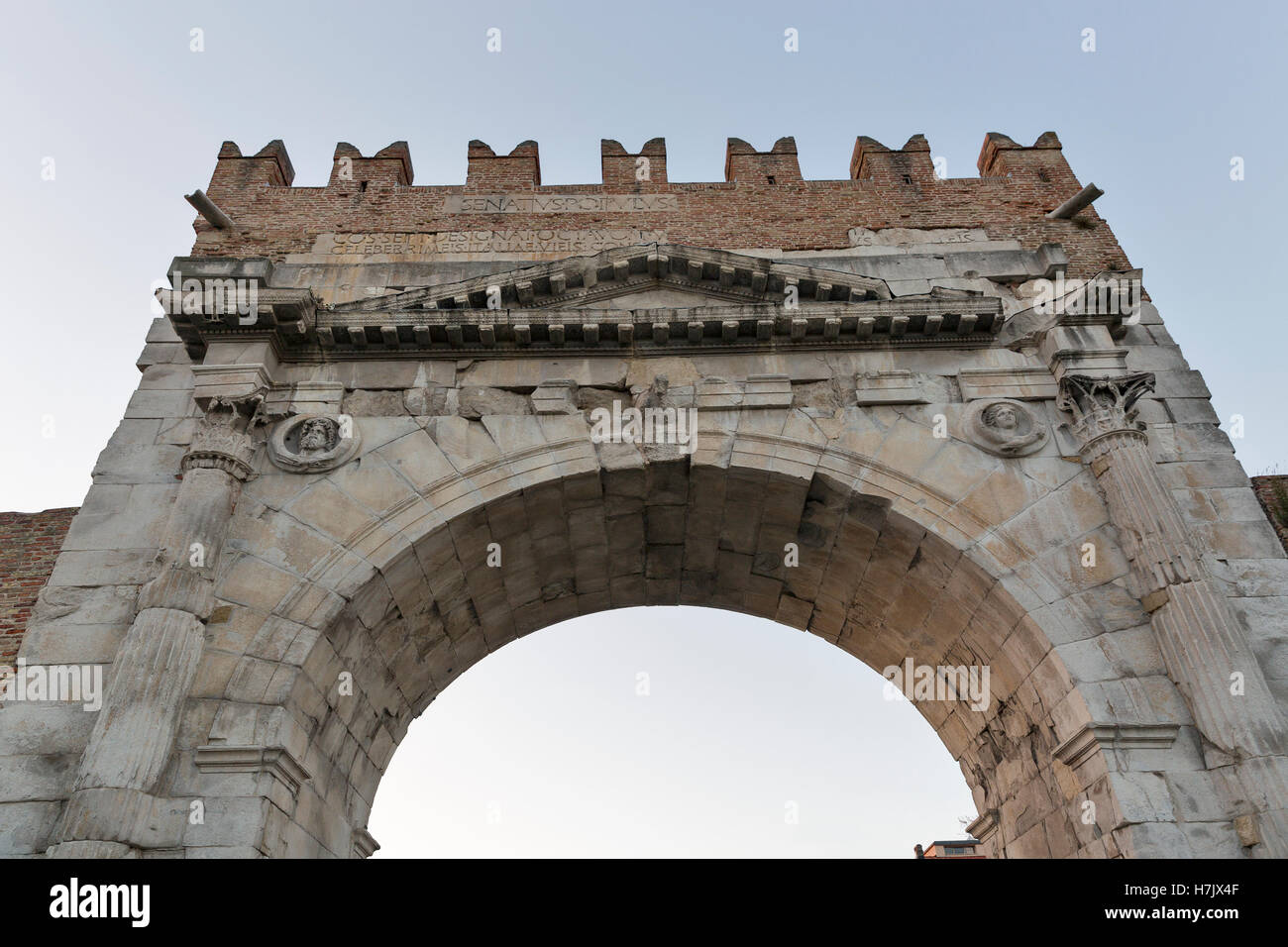 Arch of Augustus at sunset in Rimini, Italy. Ancient romanesque gate of ...