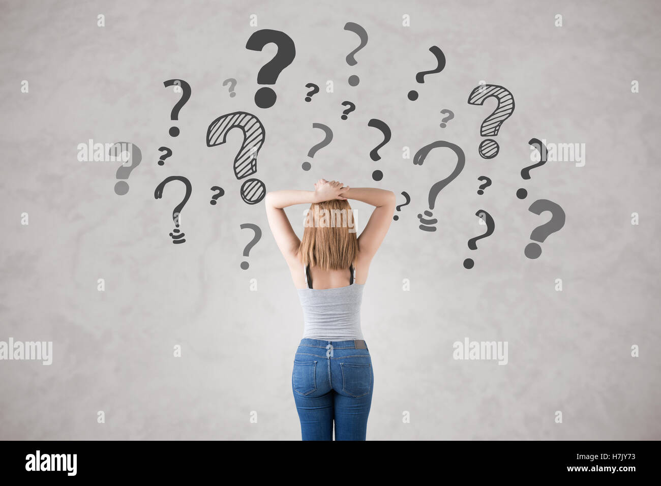 Woman thinking question marks hi-res stock photography and images - Alamy