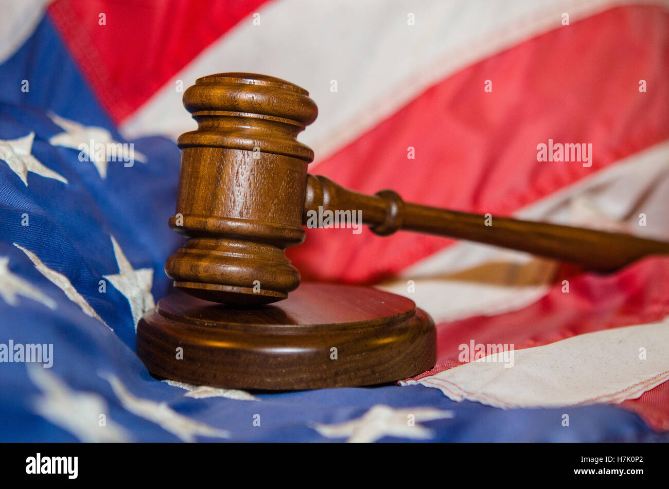 Gavel on top of American Flag Stock Photo - Alamy