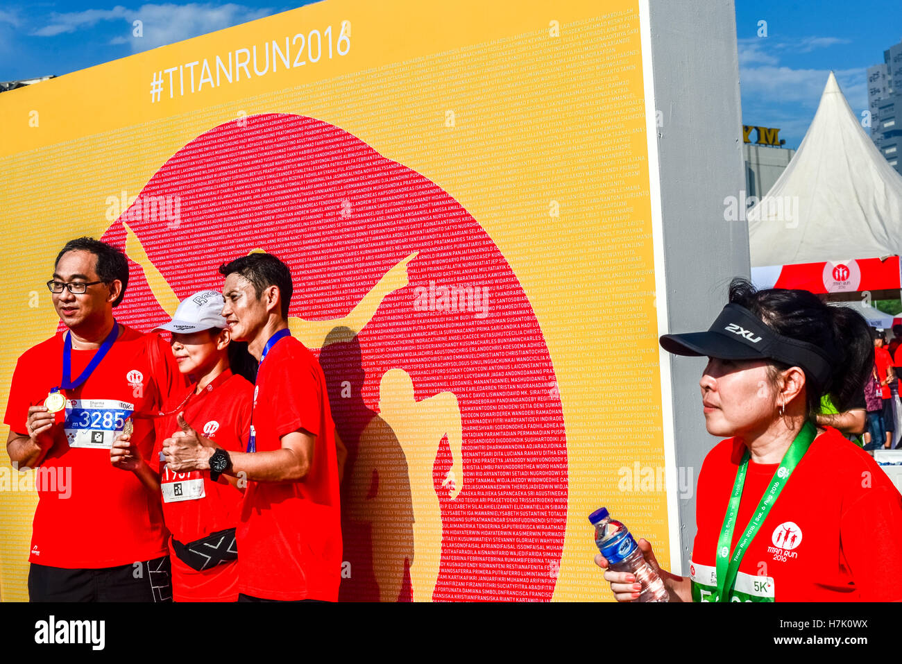 Finishers having photo session with podium backdrop after the 2017 ...