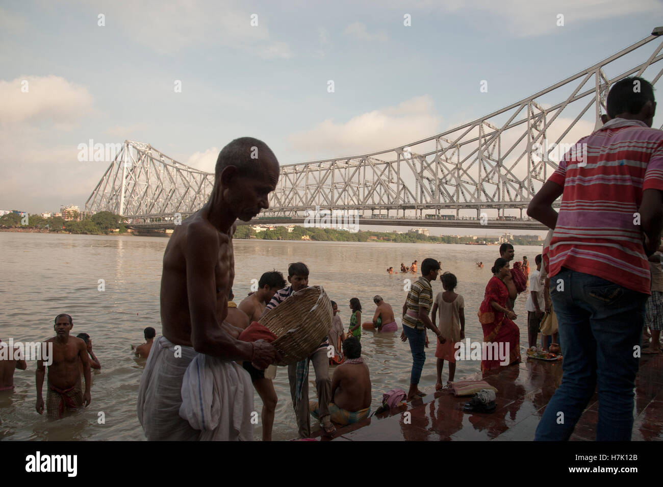 People take morning bath in Hooghly River near Howrah Bridge (Rabindra ...