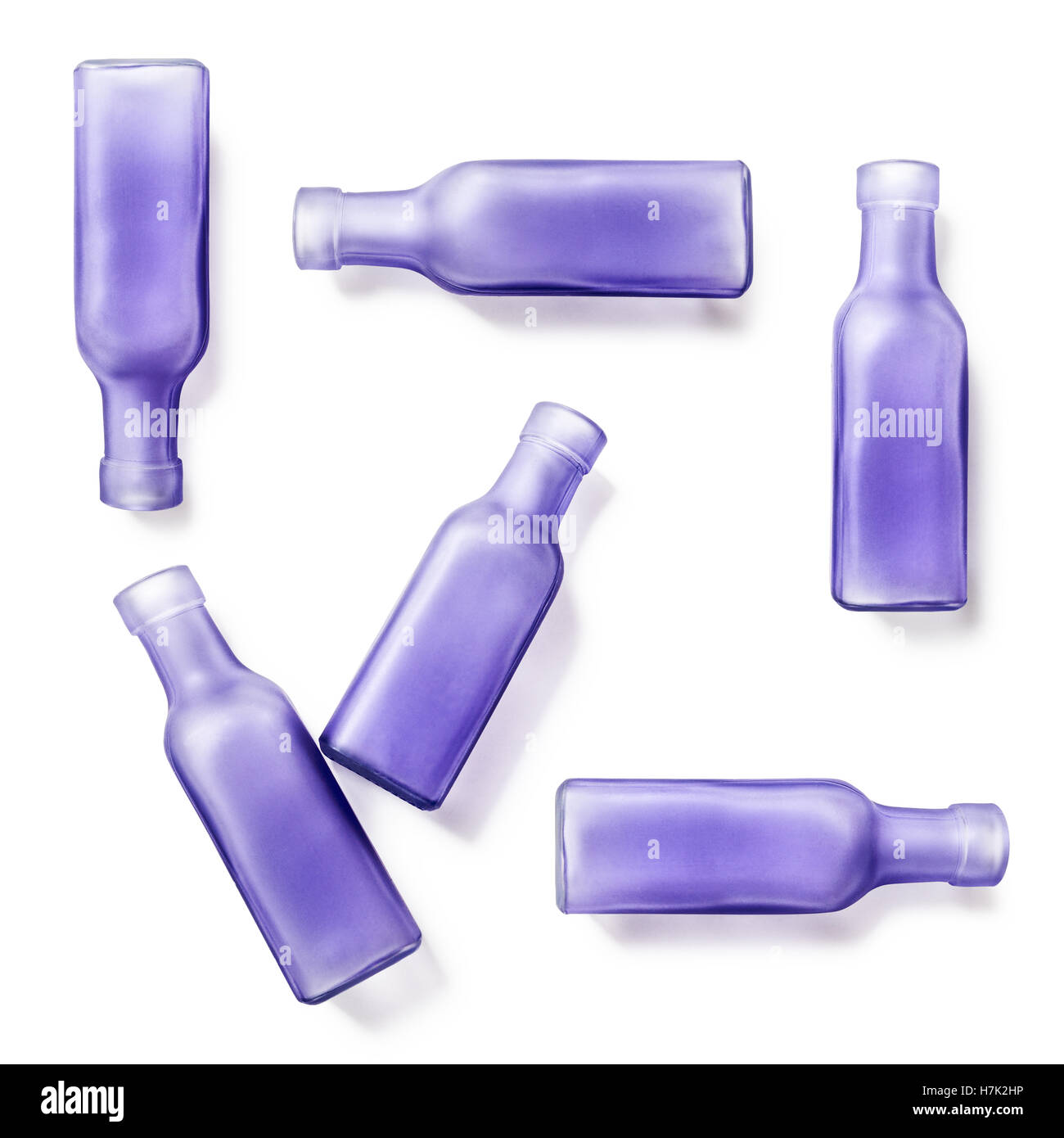 Lilac glass empty bottles collection. Handmade vases. Group of objects ...