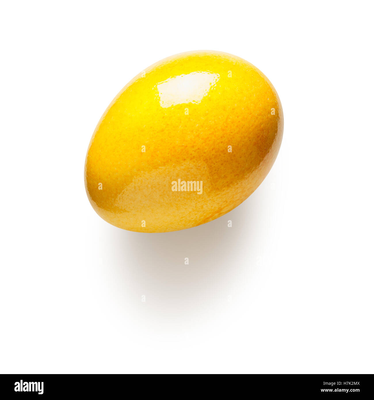 Yellow painted easter egg isolated on white background. Holiday symbol ...