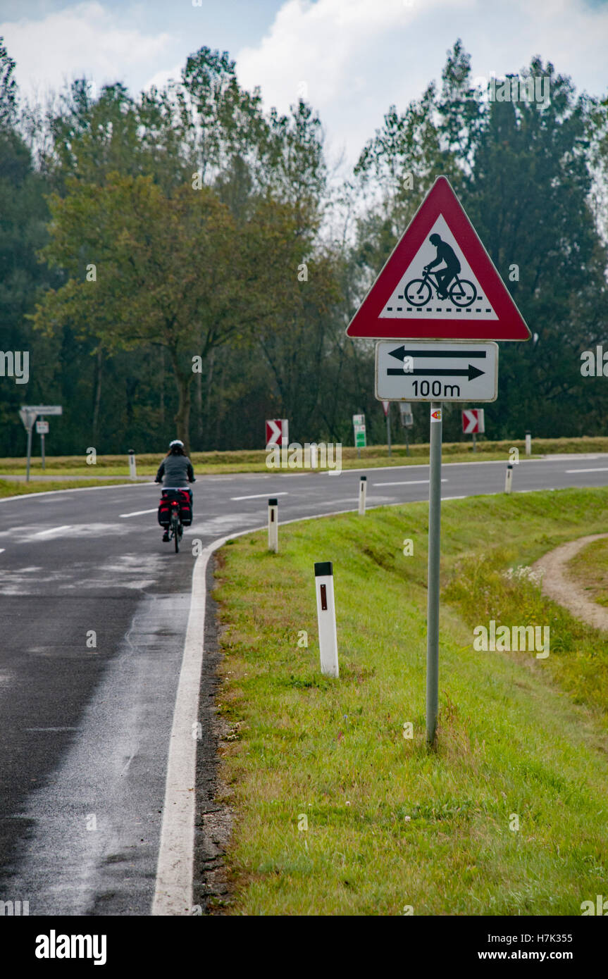 Cycling warning sign. Austria. Model release available Stock Photo - Alamy