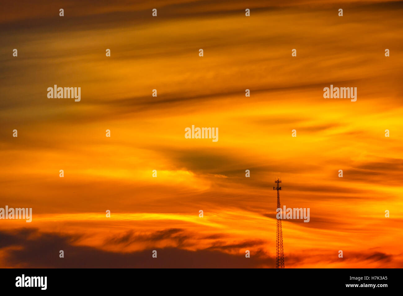 Cell phone tower in front of a beautiful sunset Stock Photo - Alamy