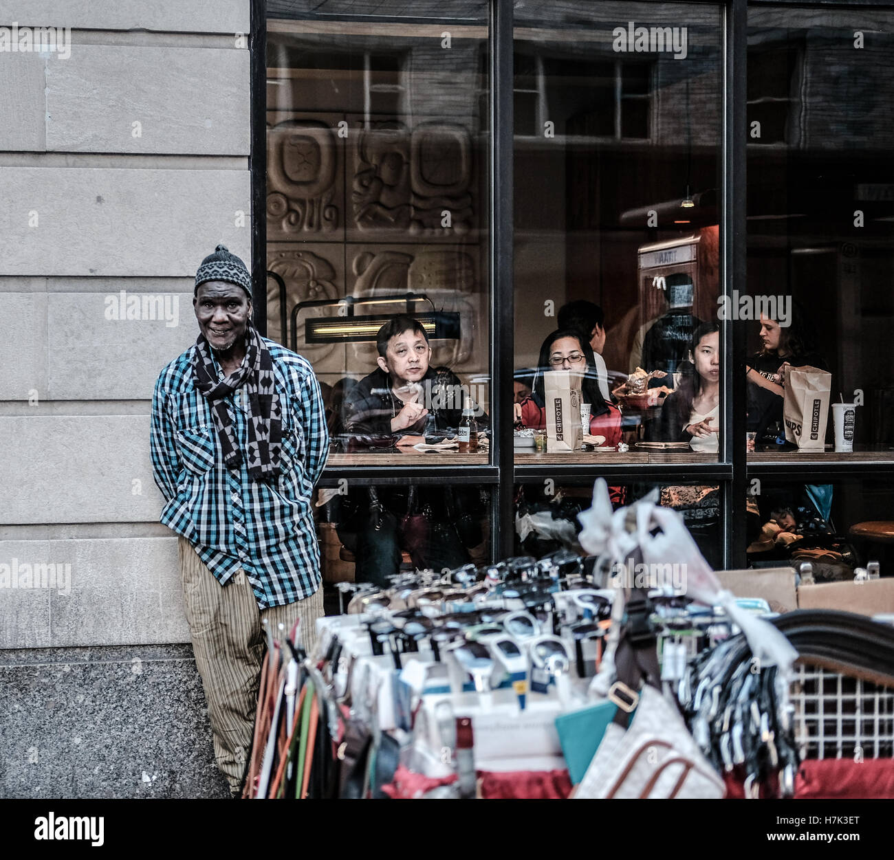 New York street trader seen posing for the camera, complete with his ...
