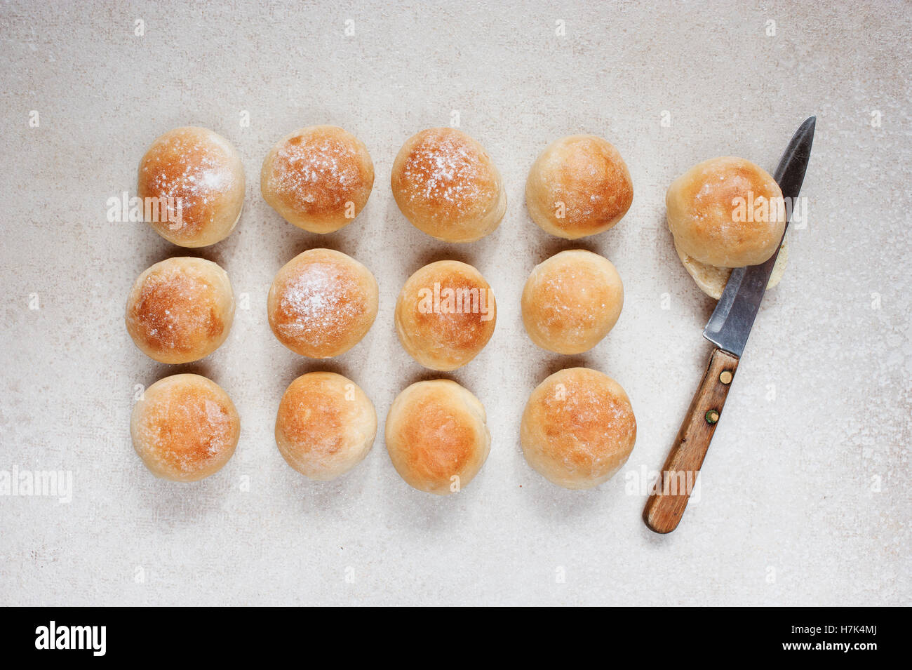 Fresh homemade buns on the light table Stock Photo - Alamy