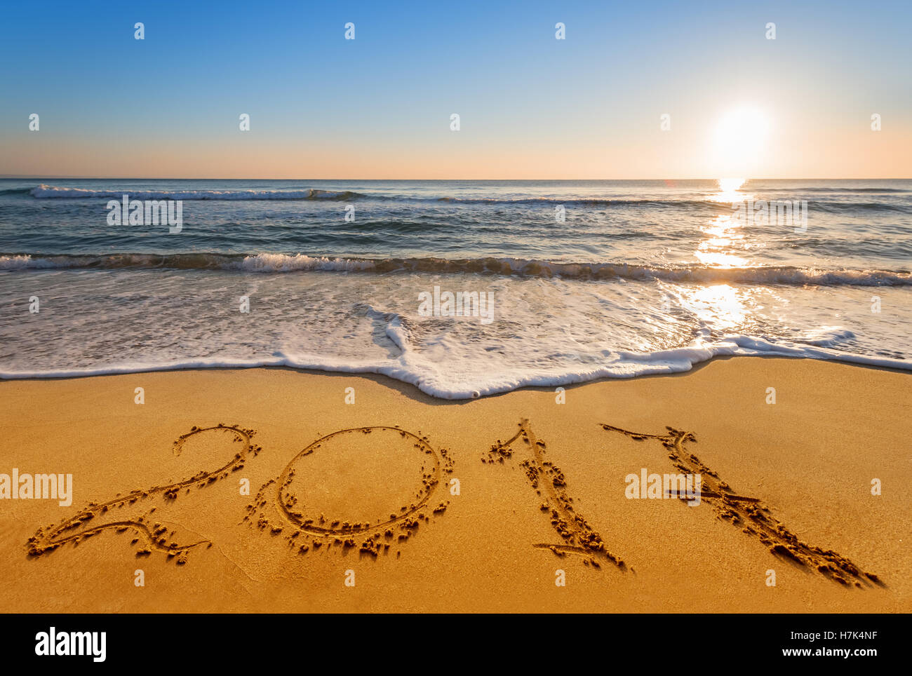 written 2017 on the beach Stock Photo - Alamy