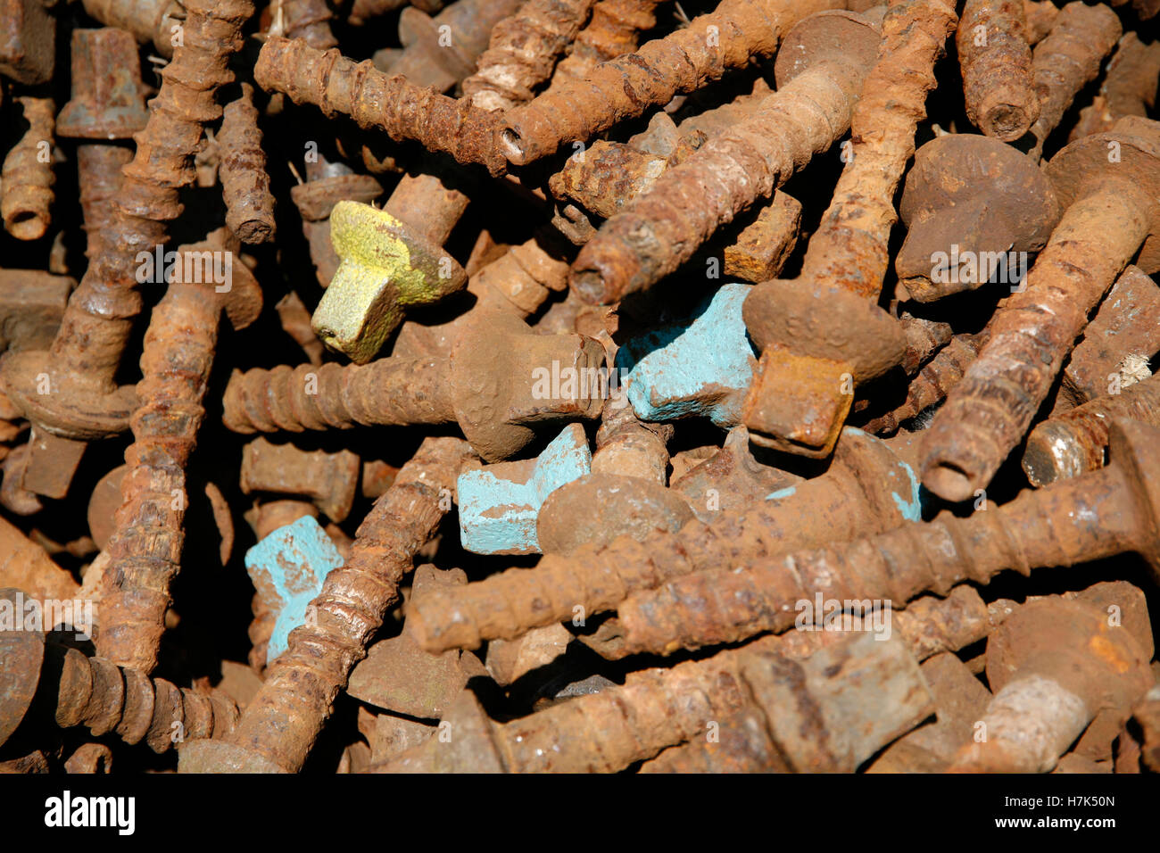 Old rusted bolts sleepers screws as a background Stock Photo - Alamy