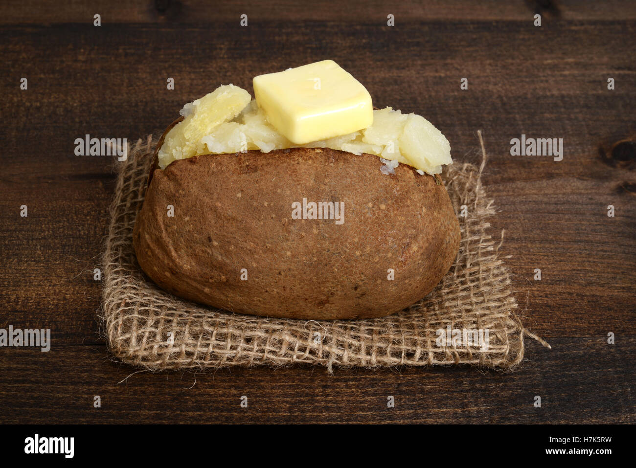 baked potato with butter Stock Photo - Alamy