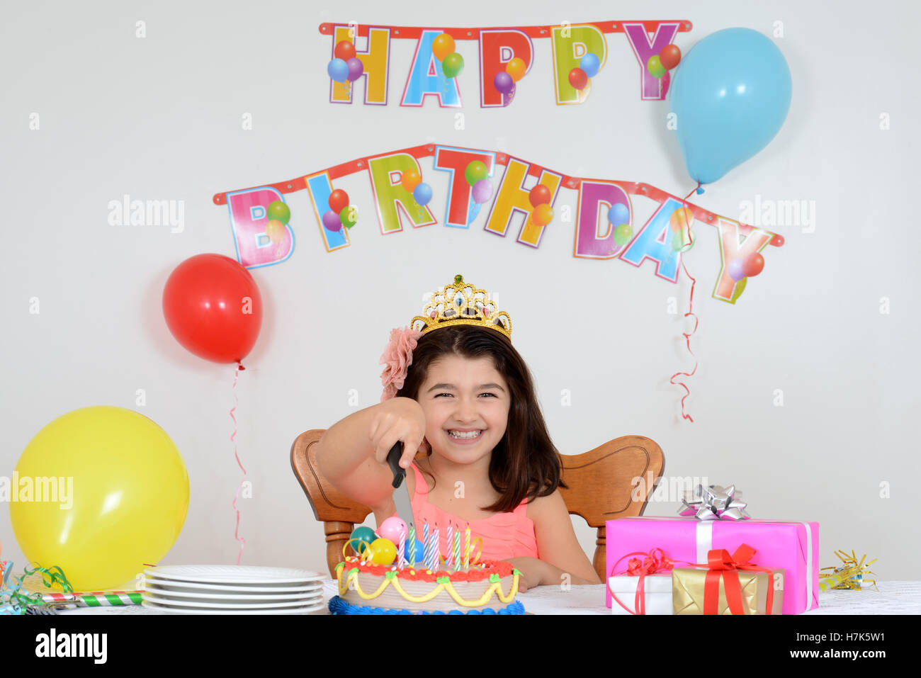 happy child cutting birthday cake Stock Photo - Alamy