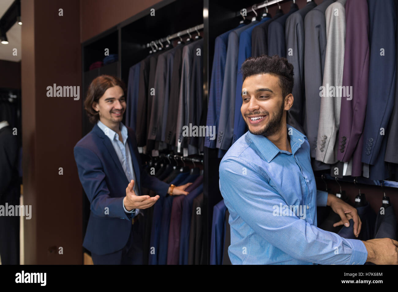 Handsome Business Man Fashion Shop, Customers Choosing Clothes In ...