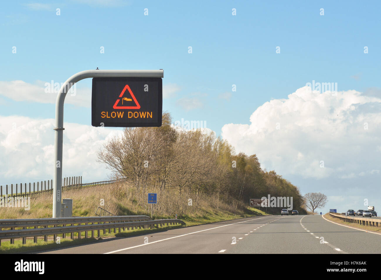 side wind cross wind motorway traffic warning sign - uk Stock Photo - Alamy