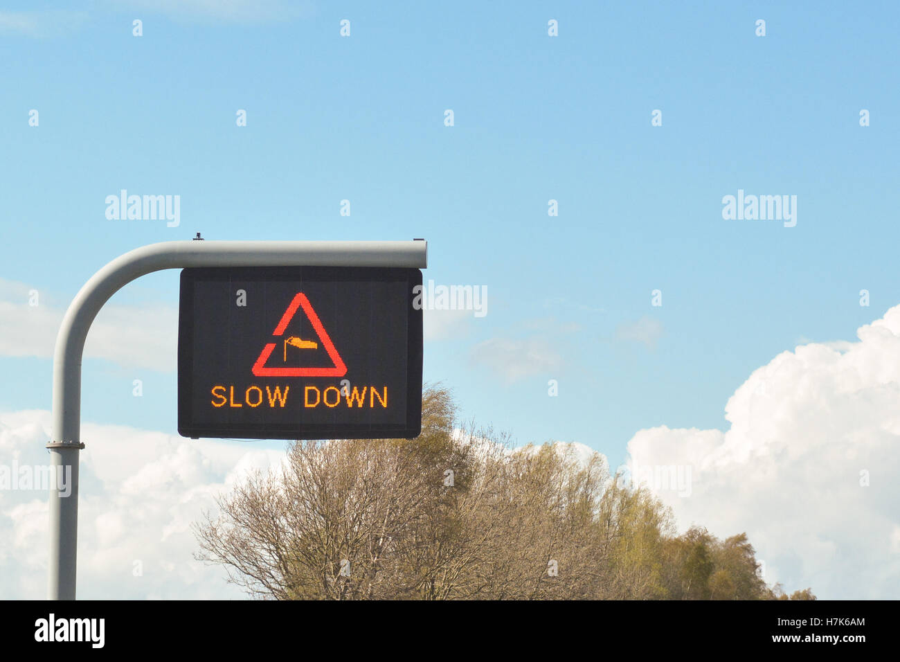 side wind cross wind motorway traffic warning sign - uk Stock Photo - Alamy