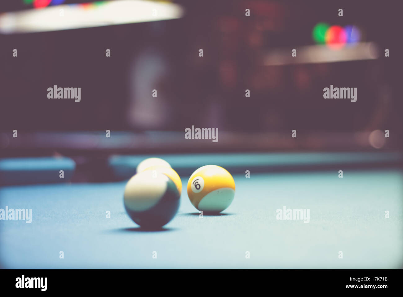 Photograph of some billiards plastic balls on table Stock Photo - Alamy