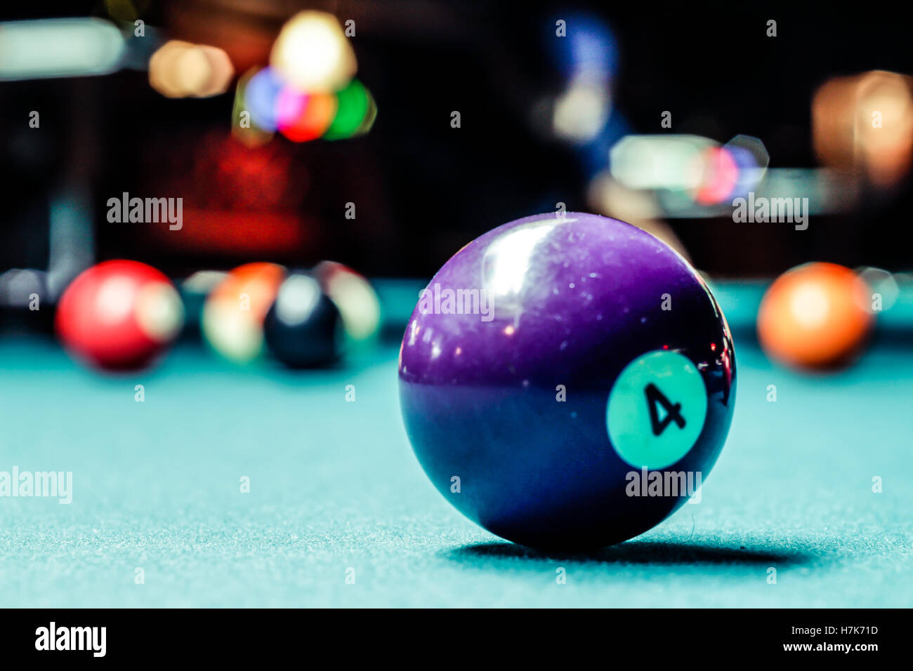 Photograph of some billiards plastic balls on table Stock Photo - Alamy