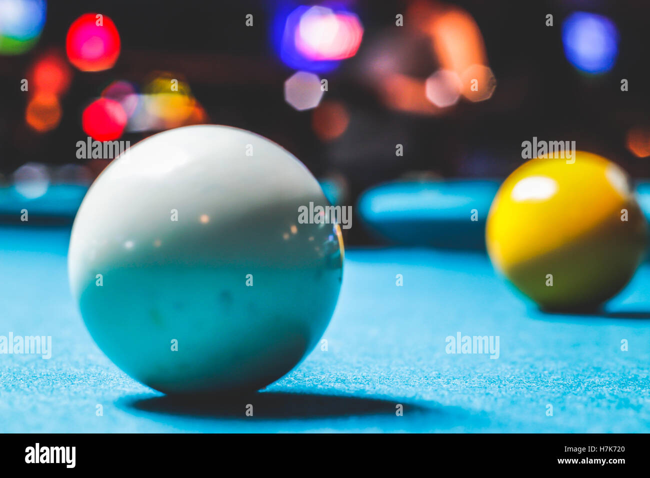 Photograph of some billiards plastic balls on table Stock Photo - Alamy